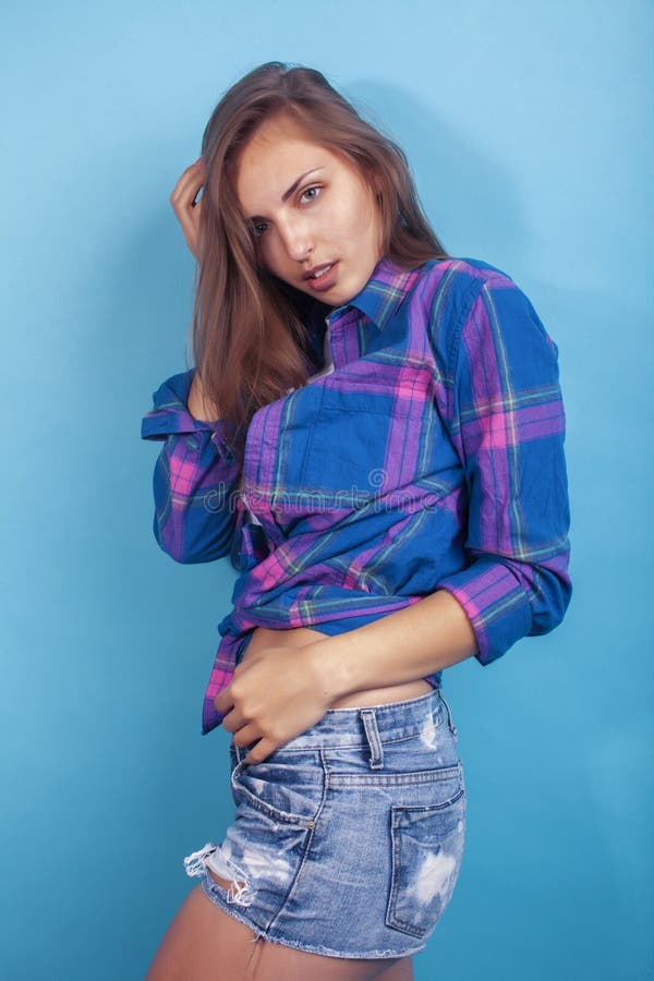 Young Pretty Girl Posing Happy Smiling On Blue Background Lifestyle