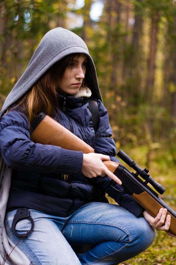 Young Pretty Girl with Rifle Stock Photo - Image of optical, girl: 78282674