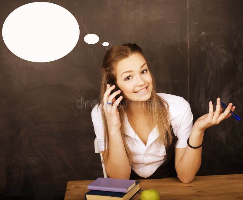 Young Pretty Girl Student in Classroom at Stock Photo - Image of female ...
