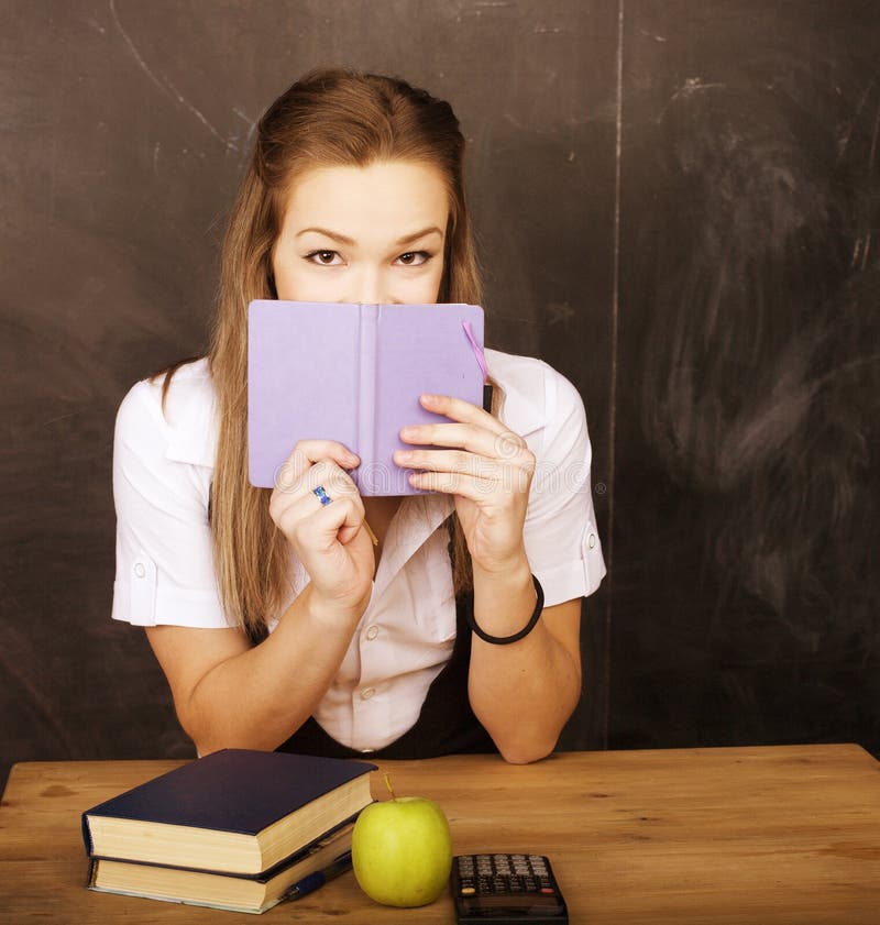 Young Pretty Girl Student in Classroom at Stock Image - Image of group ...