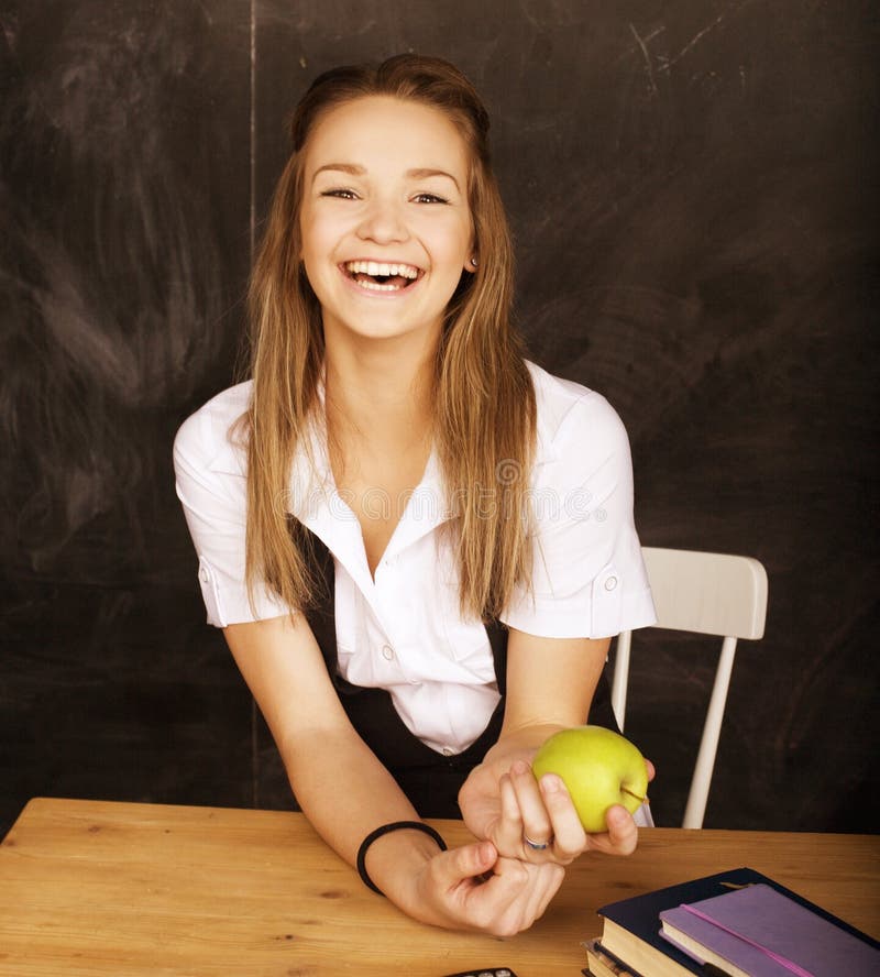 Young Pretty Girl Student in Classroom at Blackboard Stock Image ...