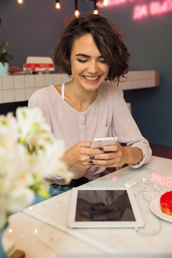 Young Pretty Girl Typing Message on Mobile Phone Stock Image - Image of ...