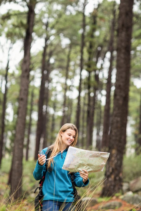 Young Pretty Hiker Using Compass and Map Stock Photo - Image of ...
