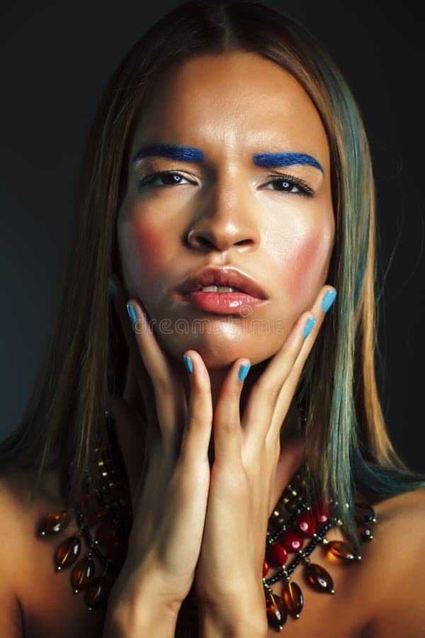 Young Pretty Modern African American Girl With Bright Fashion Makeup