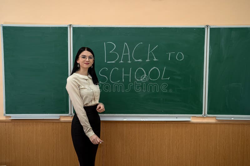 Young Pretty Teacher Standing Near Classboard Stock Image Image Of