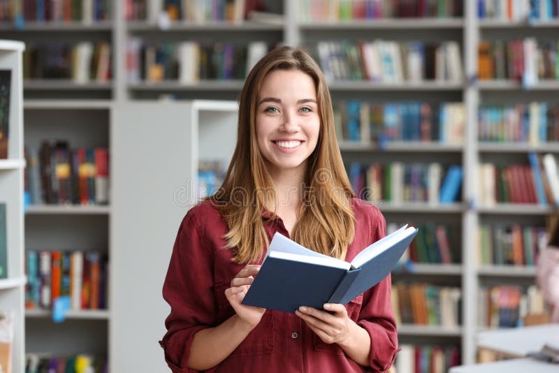 Young Pretty Woman with Book Stock Photo - Image of campus, learn ...