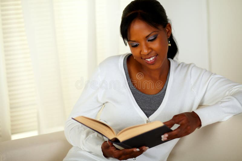 Young Pretty Woman Browsing a Book Stock Image - Image of lady, female ...