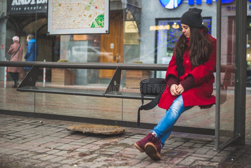 Young Pretty Woman on Bus Stop Stock Photo - Image of hipster ...