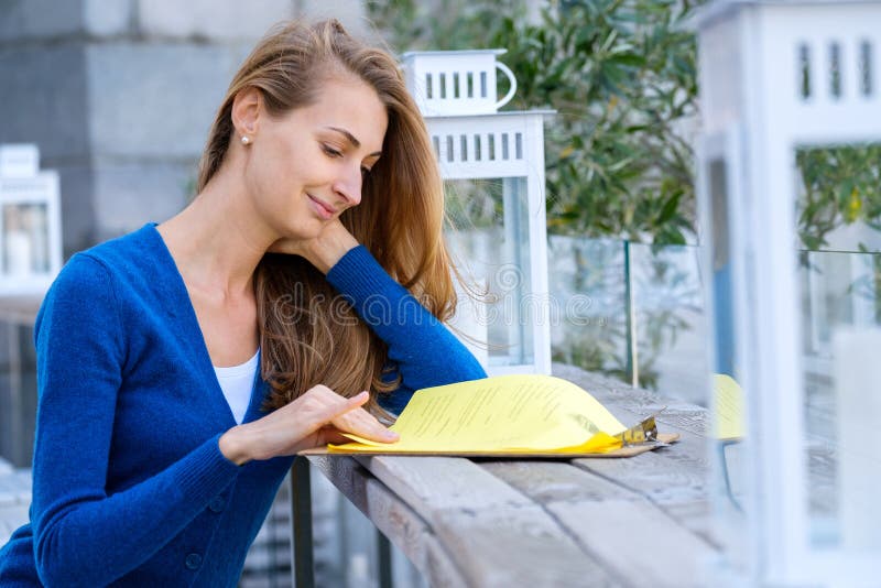 Young Pretty Woman Reading Menu Stock Image - Image of woman, people ...