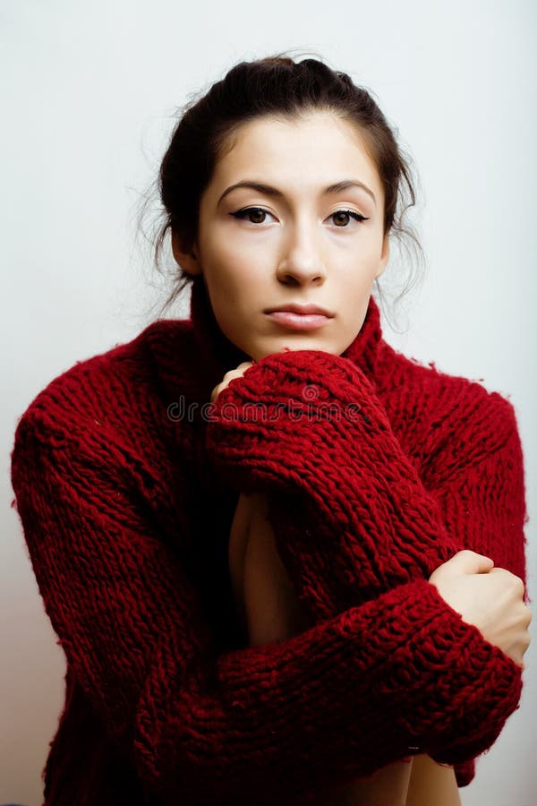 Young Pretty Woman In Sweater And Scarf All Over Her Face Lifes Stock