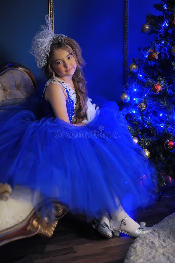 Young Princess in a Blue Evening Dress Stock Photo - Image of angel ...