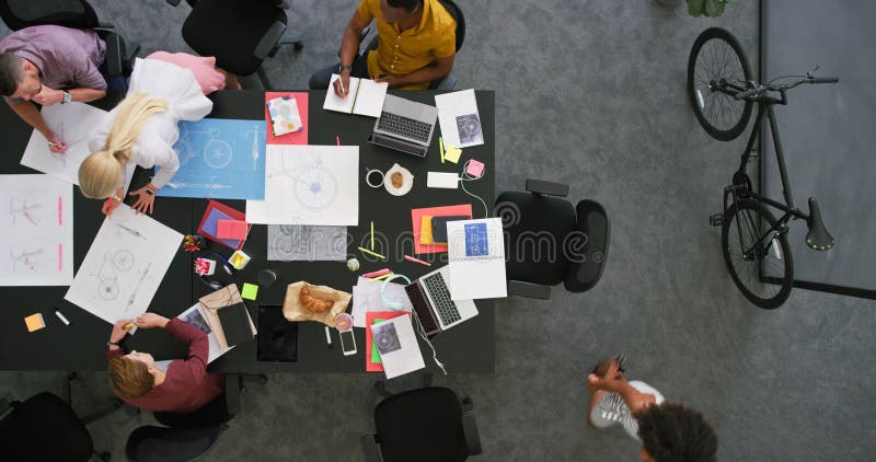 A Productive Team of Corporate Employees Working Together in the Office ...