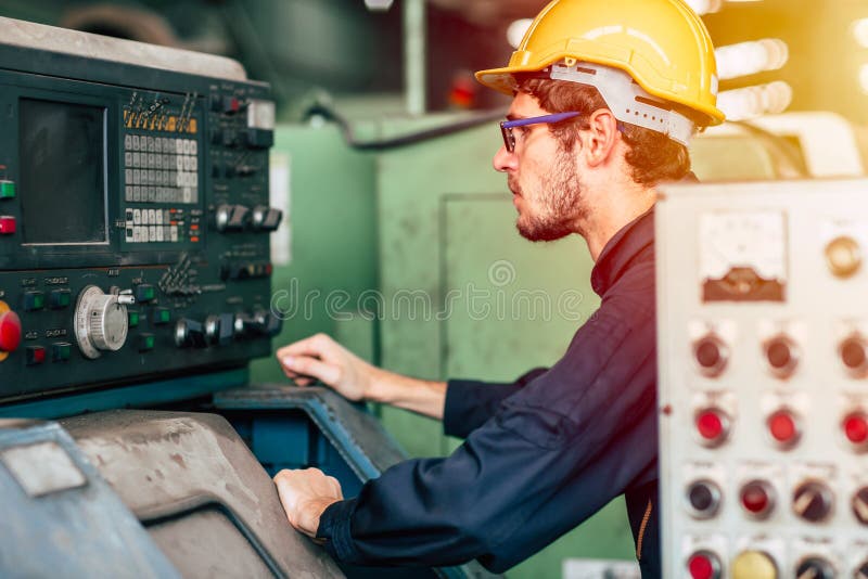 Young Profession Technician Engineer Operate Heavy Machine To Automated ...