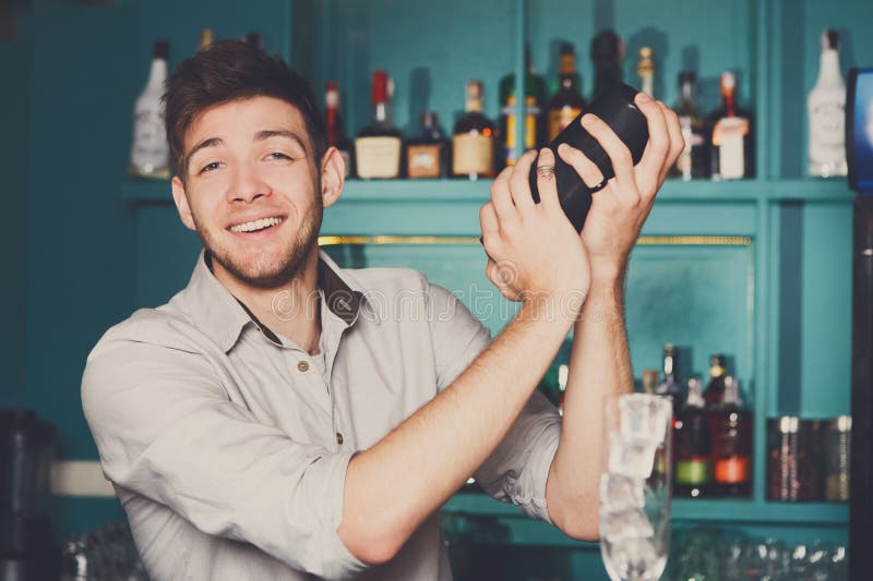Bartender Shaking and Mixing Alcohol Cocktail Stock Photo - Image of ...