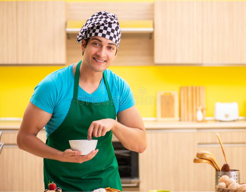 Young Professional Cook Preparing in Kitchen Stock Photo - Image of ...