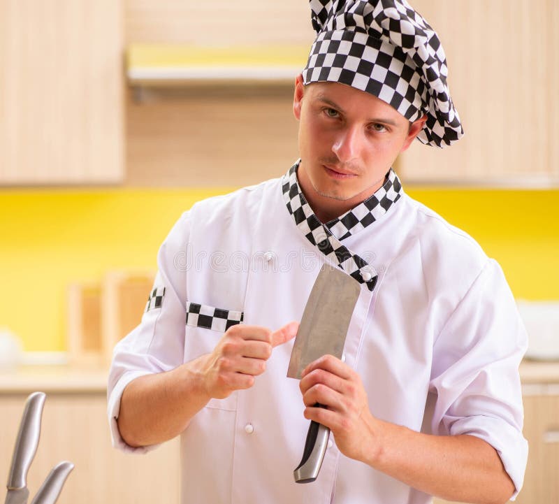 Young Professional Cook Preparing Salad at Kitchen Stock Photo - Image ...