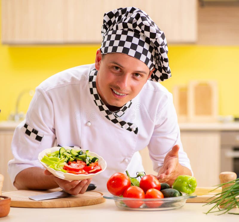 Young Professional Cook Preparing Salad at Kitchen Stock Image - Image ...