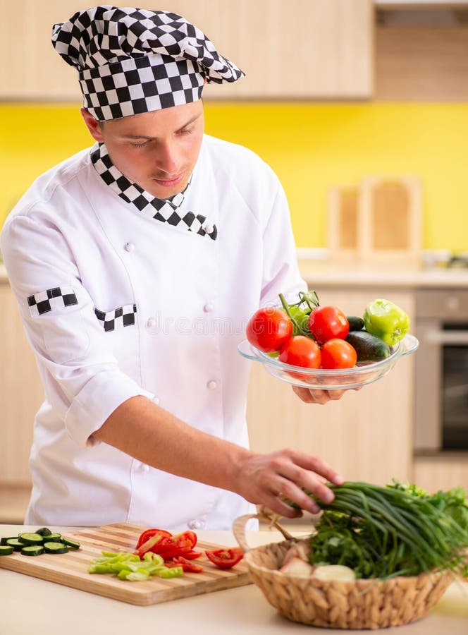 Young Professional Cook Preparing Salad at Kitchen Stock Image - Image ...