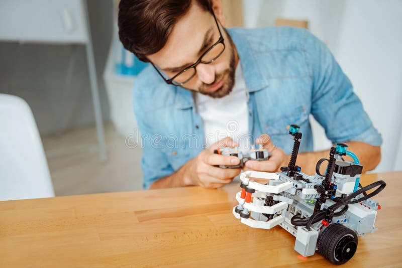 Young Professional Engineeer Testing Robot Stock Image - Image of ...