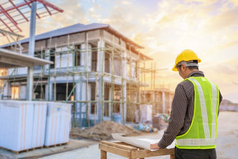 Professional Engineer Worker at the House Building Construction Stock ...