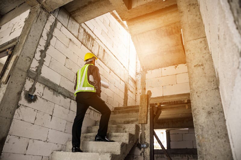 Professional Engineer Worker at the House Building Construction Stock ...