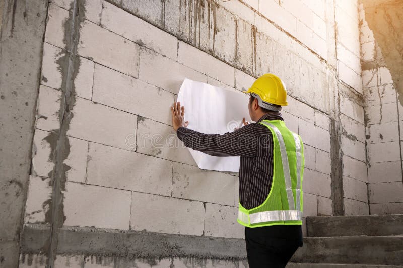 Professional Engineer Worker at the House Building Construction Stock ...