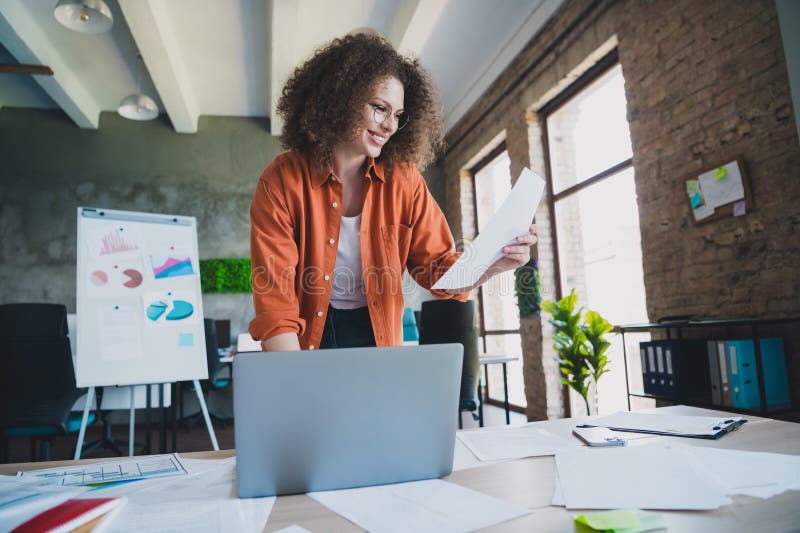 Professional Young Businesswoman Working Enthusiastically in a Modern ...