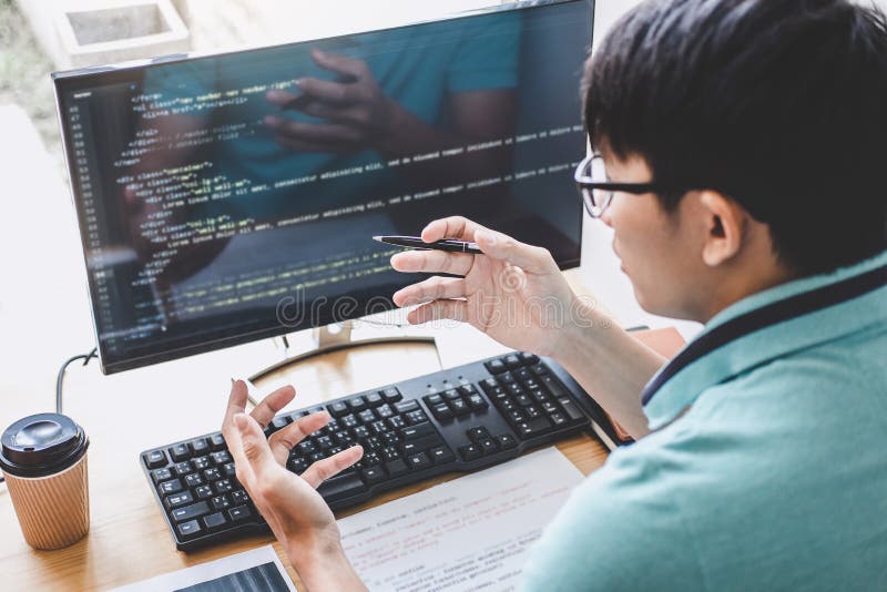 Young Professional Programmer Working At Developing Programming And Website Working In A