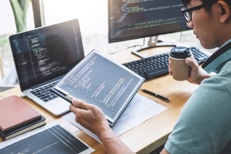 Young Professional Programmer Working At Developing Programming And Website Working In A