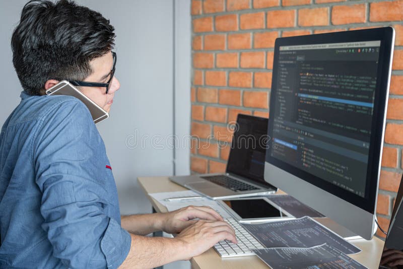 Young Professional Programmer Working At Developing Programming And Website Working In A