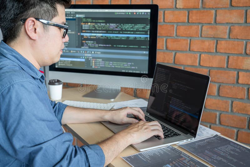 Young Professional Programmer Working At Developing Programming And Website Working In A