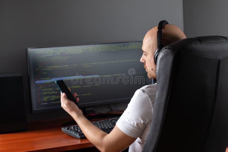 Young Professional Programmer Working at Developing Programming and Website Working in a ...