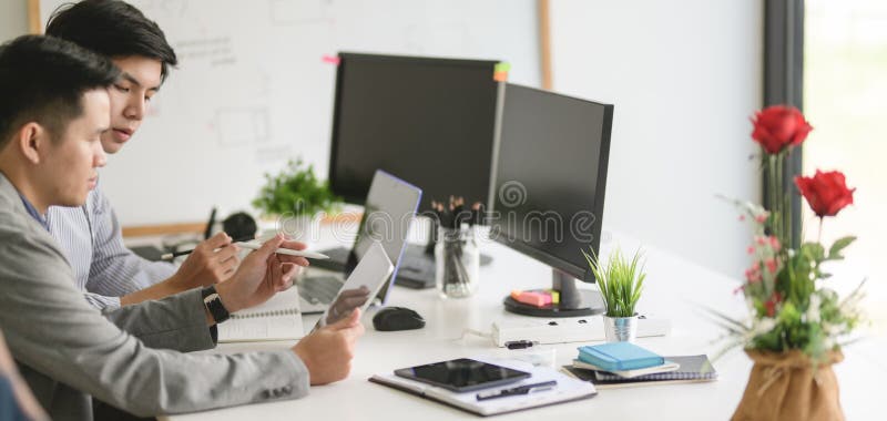 Young Professional UX Web Developer Team Working on Their Smartphone ...