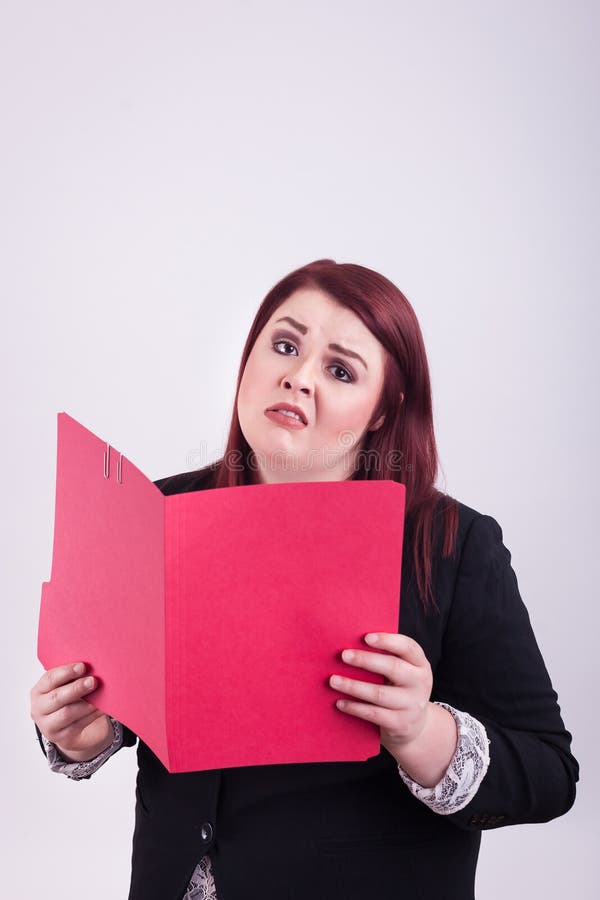 Young Professional Female Holding an Opened Red File Folder Worried ...