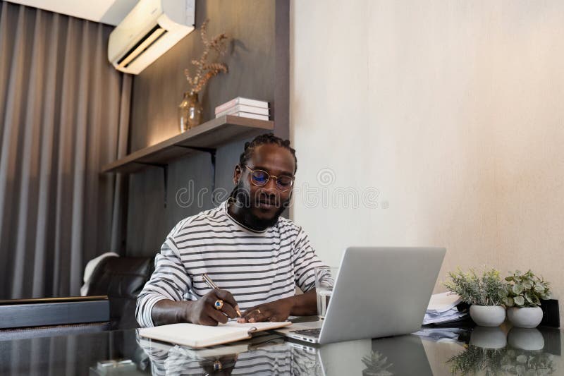 Young Professional Working Remotely from Home Office with Laptop and ...