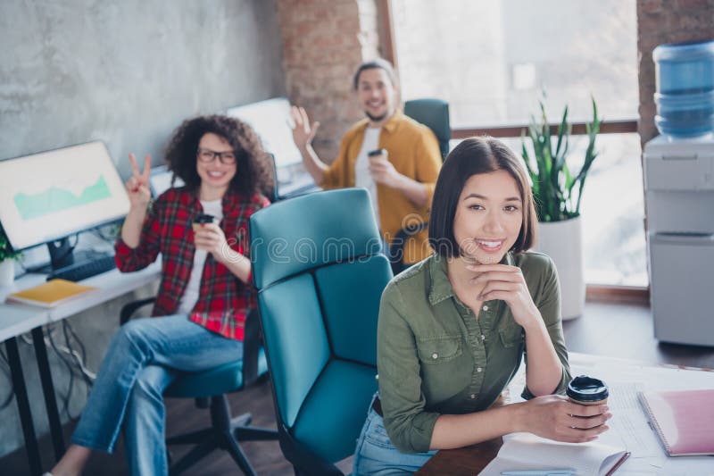 Young Professionals Collaborating in a Modern Office with a Friendly ...