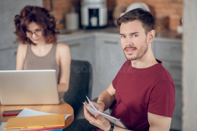 Young Professionals Working Together and Looking Interested Stock Photo ...