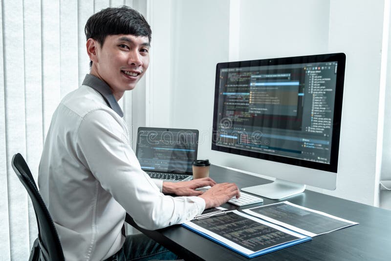 Young Programmer Working In Software Javascript Computer In It Office 5899