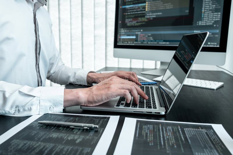 Writing Codes and Typing Data Code Technology, Programmer Cooper Stock ...