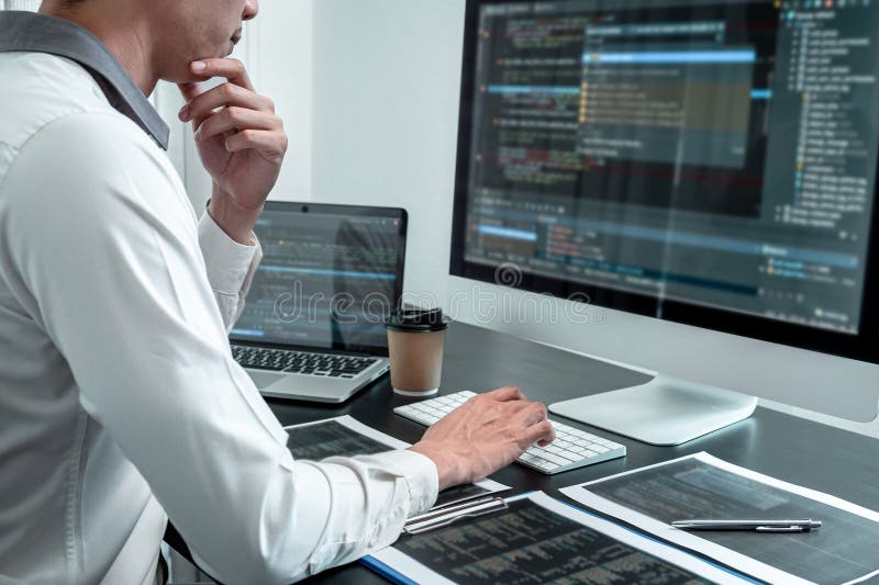 Writing Codes and Typing Data Code Technology, Programmer Cooper Stock ...