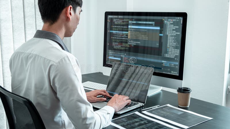 Writing Codes and Typing Data Code Technology, Programmer Cooper Stock ...