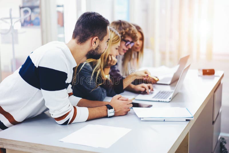 Young it Programmers Collaborating on Creating Application Using ... Young it Programmers Collaborating on Creating Application Using ...