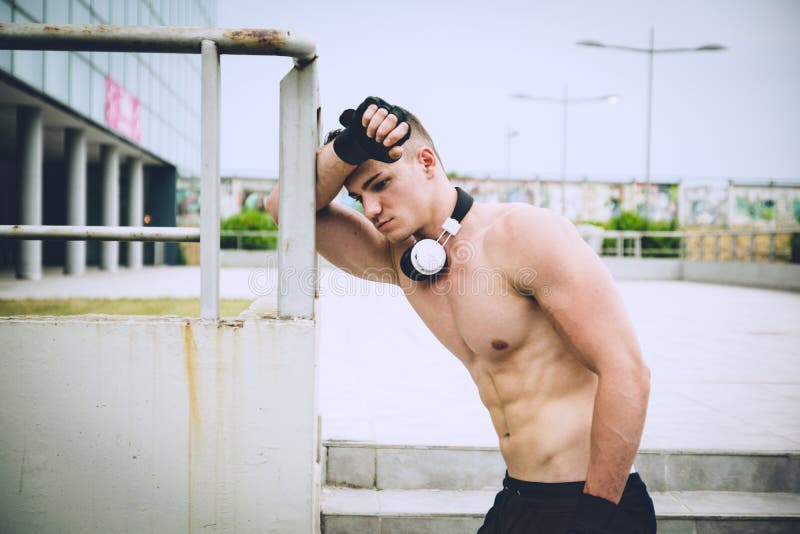 Young Proud Man Relaxing after a Very Hard Workout. Selective Focus ...