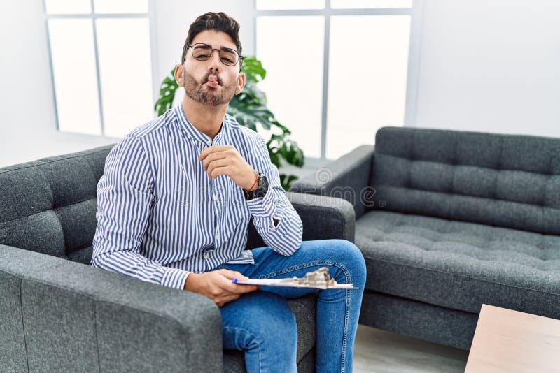Young Psychologist Man at Consultation Office Making Fish Face with ...