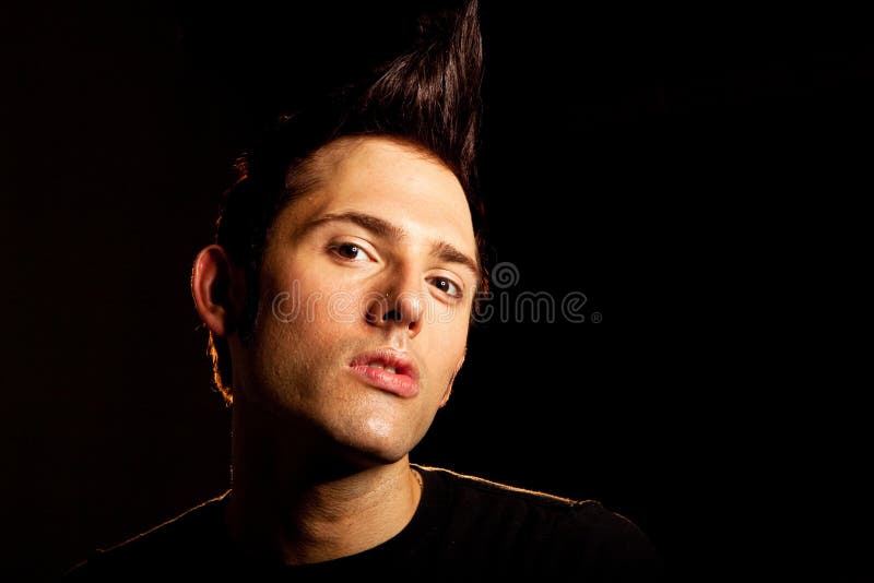 Young Punk Rocker Staring and Looking Mean. Stock Photo - Image of ...
