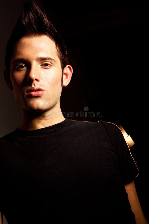 Young Punk Rocker Staring and Looking Mean. Stock Photo - Image of ...