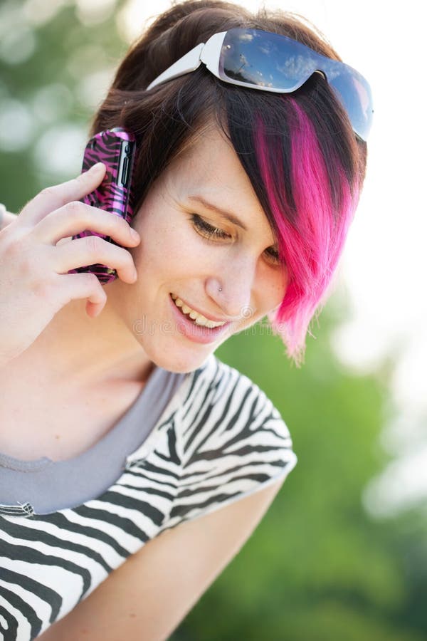 Young Punk Woman on a Cell Phone Stock Image - Image of natural ...