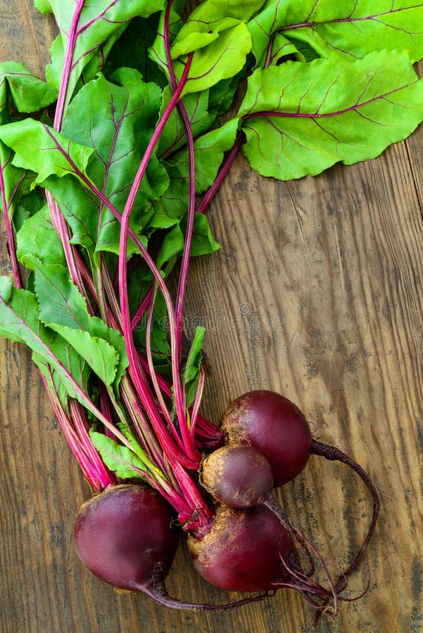 Young Raw Organic Red Beets on Wooden Table Stock Photo - Image of ...