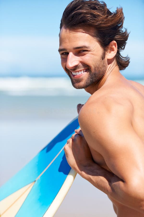 Young and Ready for Summer Fun. a Young Man Leaning on His Surfboard ...