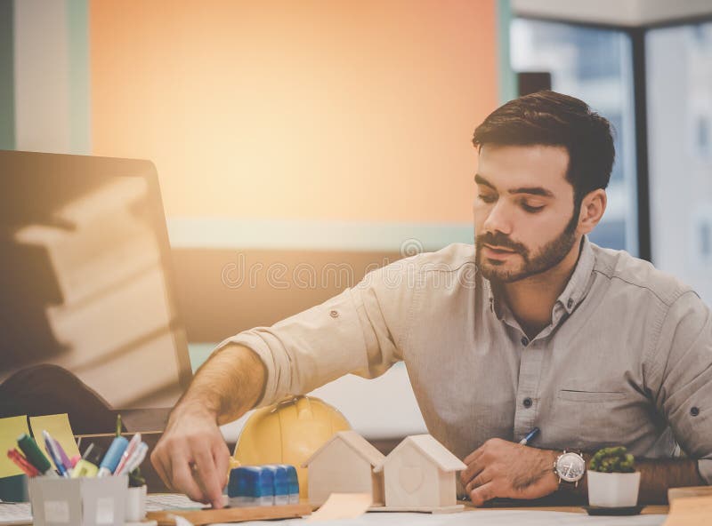 Team of Young Real Estate Contractor Brainstorming in Office Stock ...